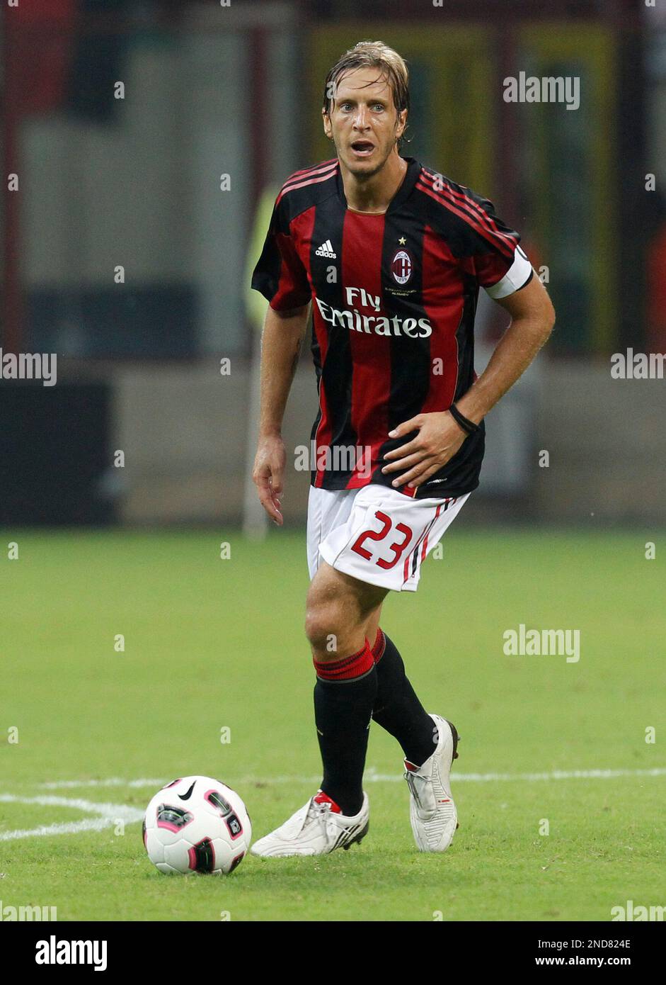 AC Milan midfielder Massimo Ambrosini controls the ball during the ...