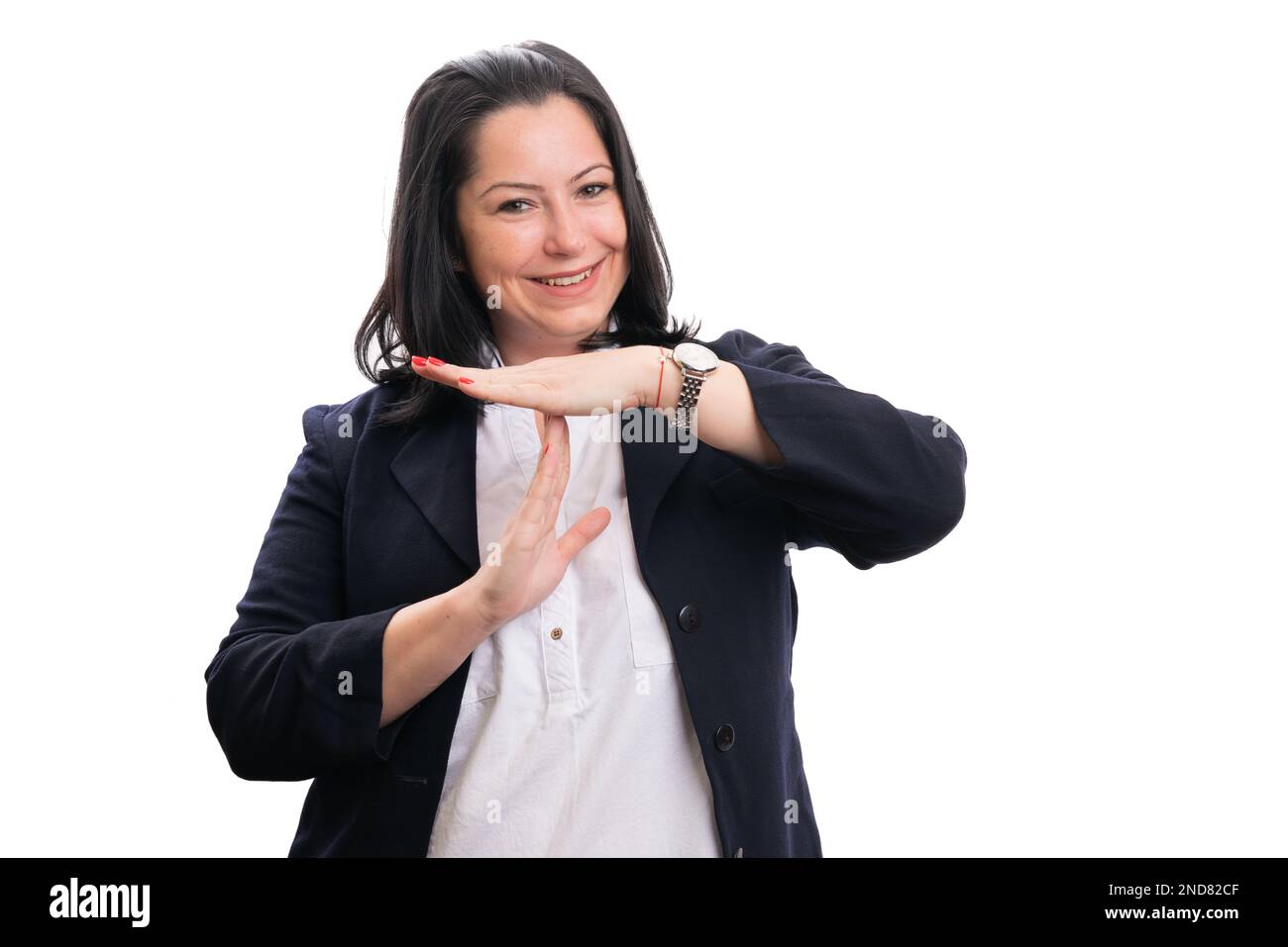 Adult businesswoman smiling with friendly expression in formalwear ...