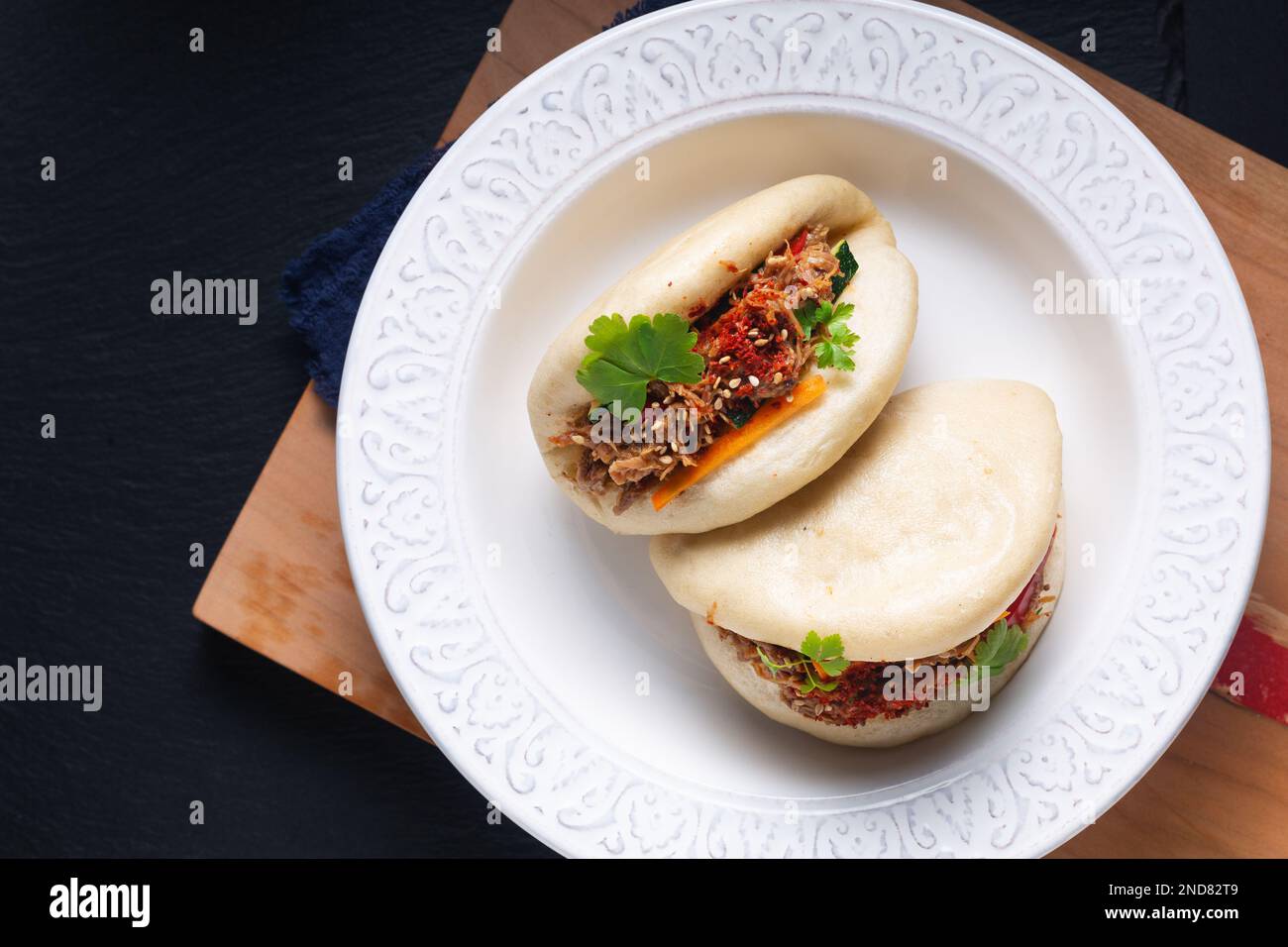 Food concept Homemade organic Pulled Beef Bao Buns or Gua Bao in white ...