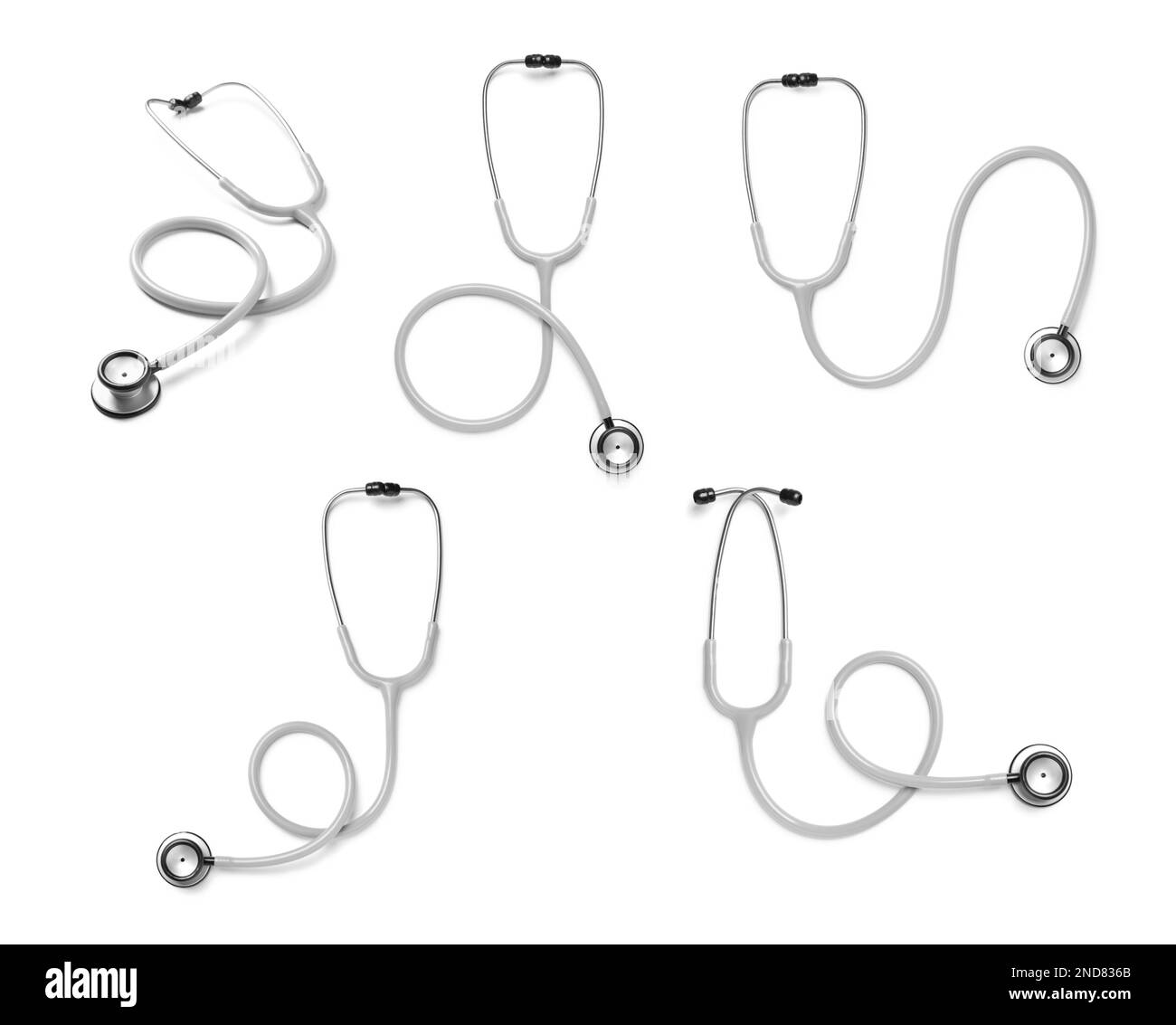 Set with stethoscopes on white background Stock Photo - Alamy