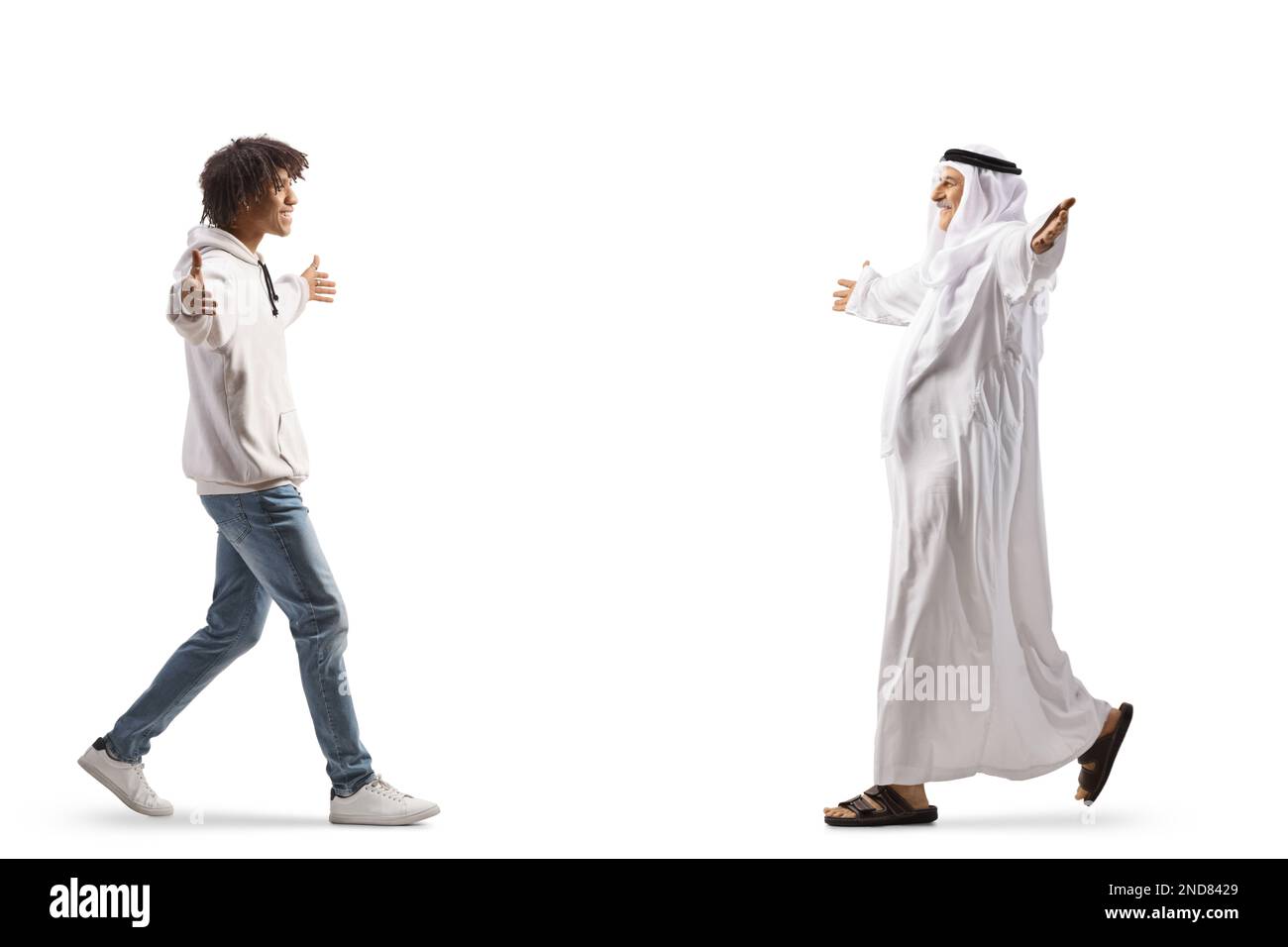 African american young man meeting a mature muslim man isolated on ...