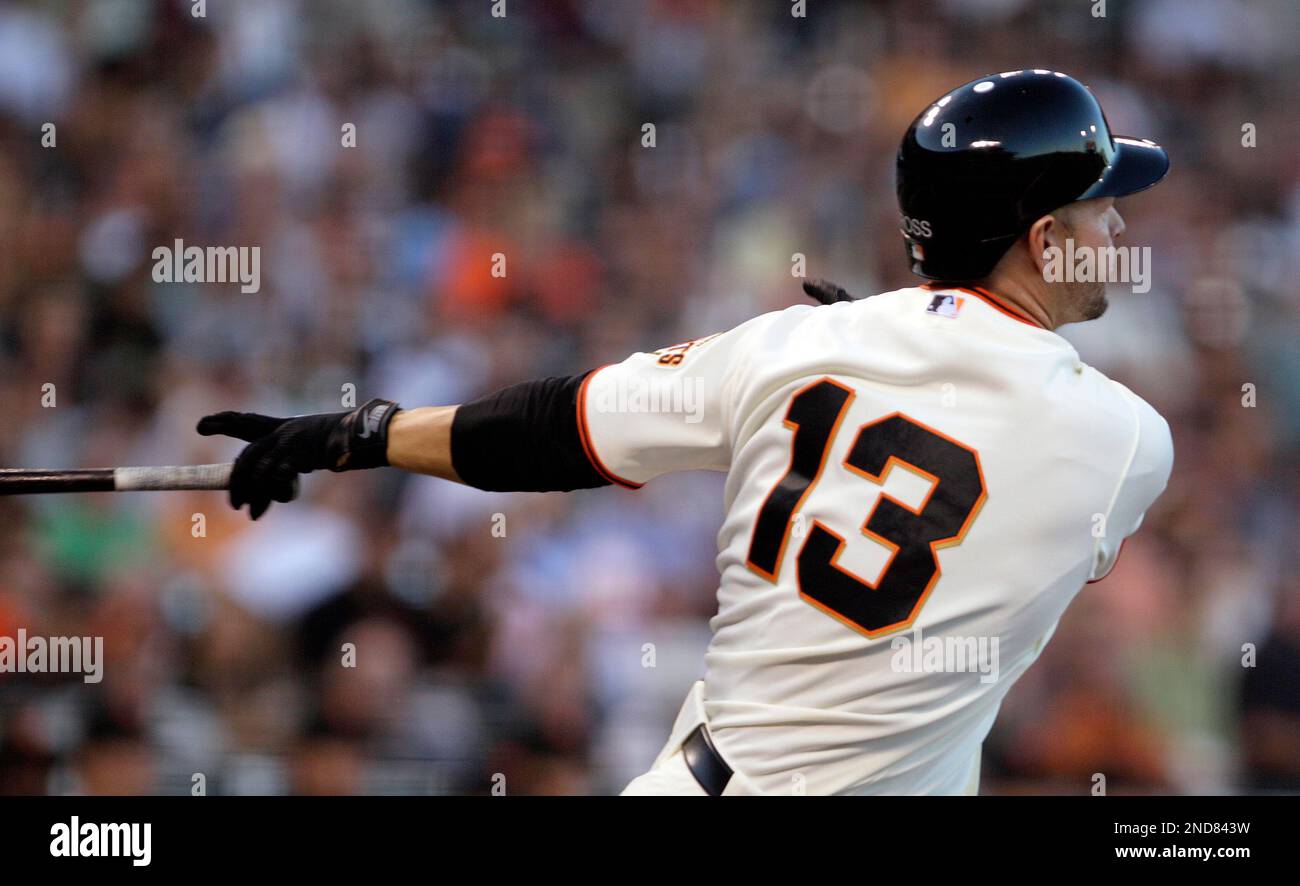 San Francisco Giants' Cody Ross watches his RBI single off Cincinnati ...