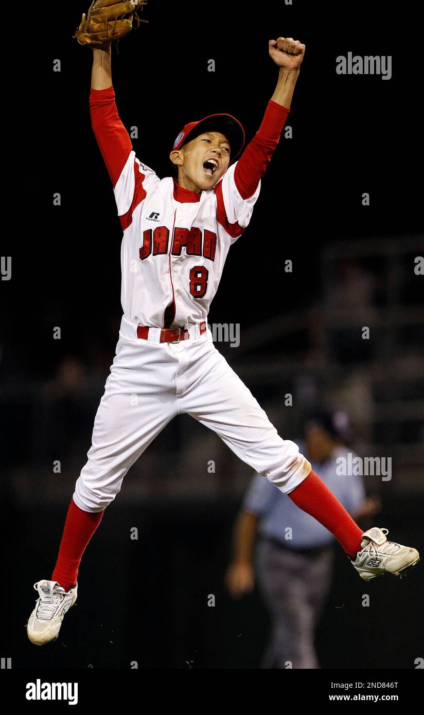 Tokyo, Japan pitcher Ichiro Ogasawara reacts after striking out Nuevo ...