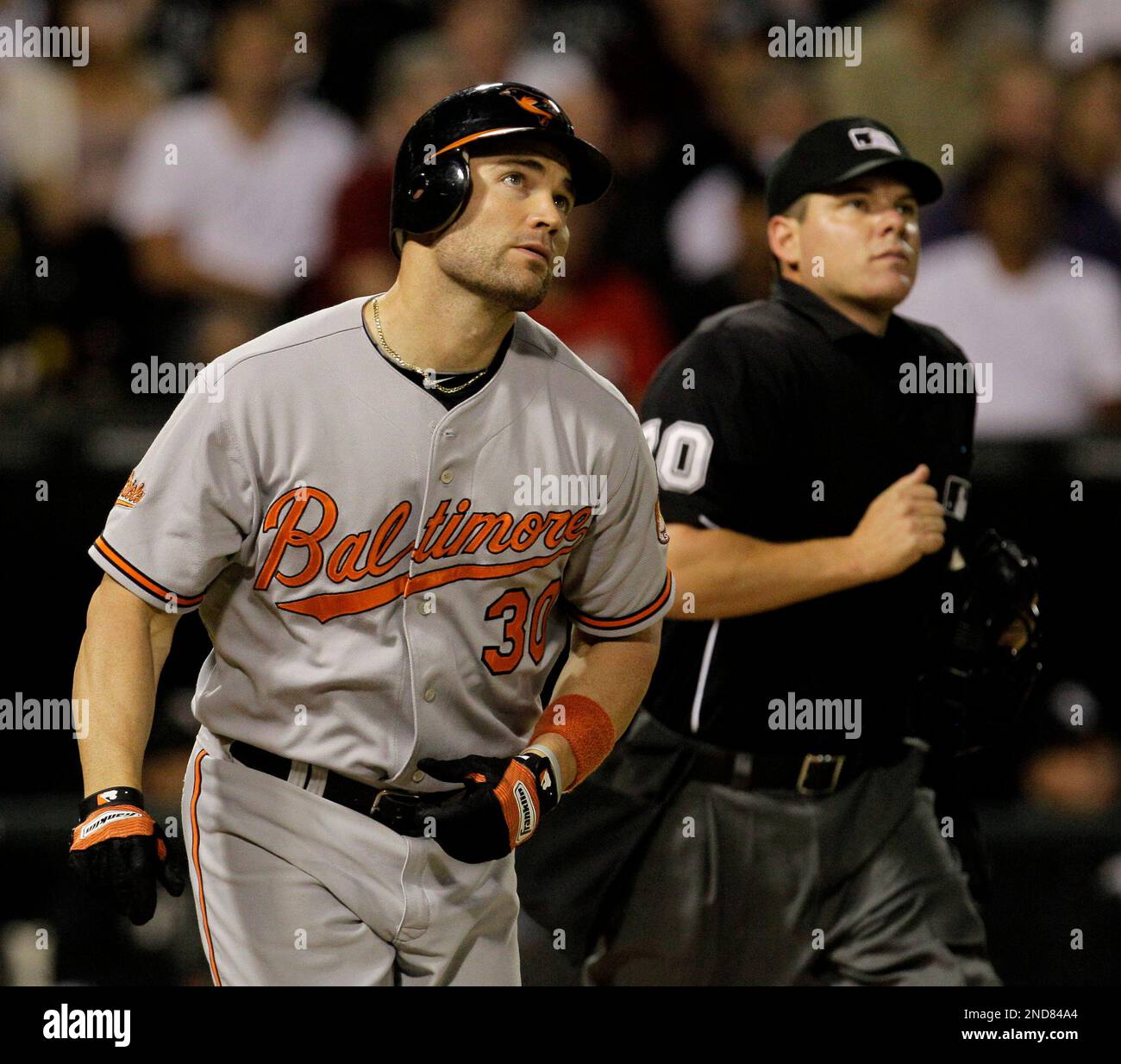 Baltimore Orioles' Luke Scott, left, and home plate umpire D. J ...