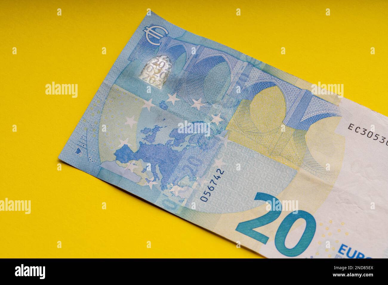20 euro banknote close up, yellow background for business finance ...