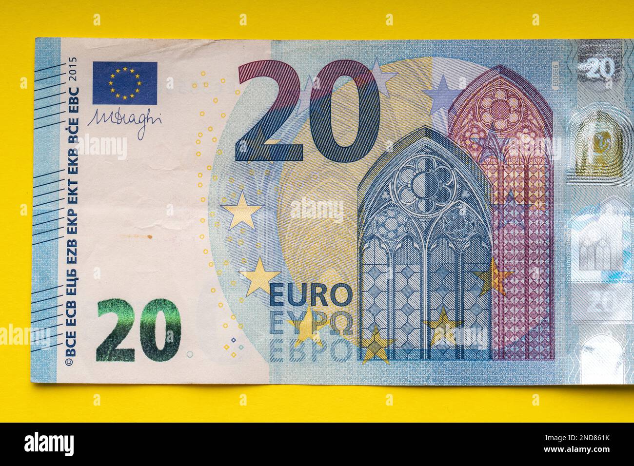 20 euro banknote close up, yellow background for business finance ...