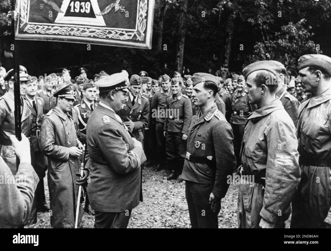 Reich Marshal Hermann Goering accepting reports from plane-crews during ...