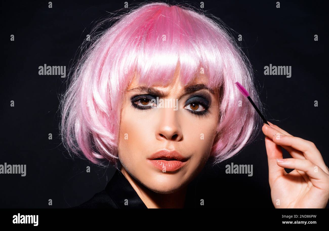 Eyebrow makeup. Beauty funny model shaping brows with brow pencil ...