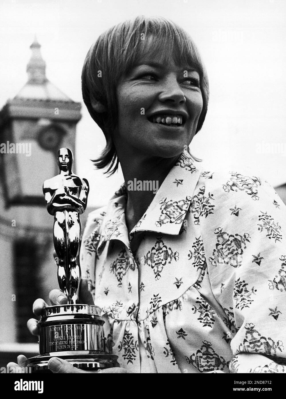 British actress Glenda Jackson holds up her Oscar award which she won ...