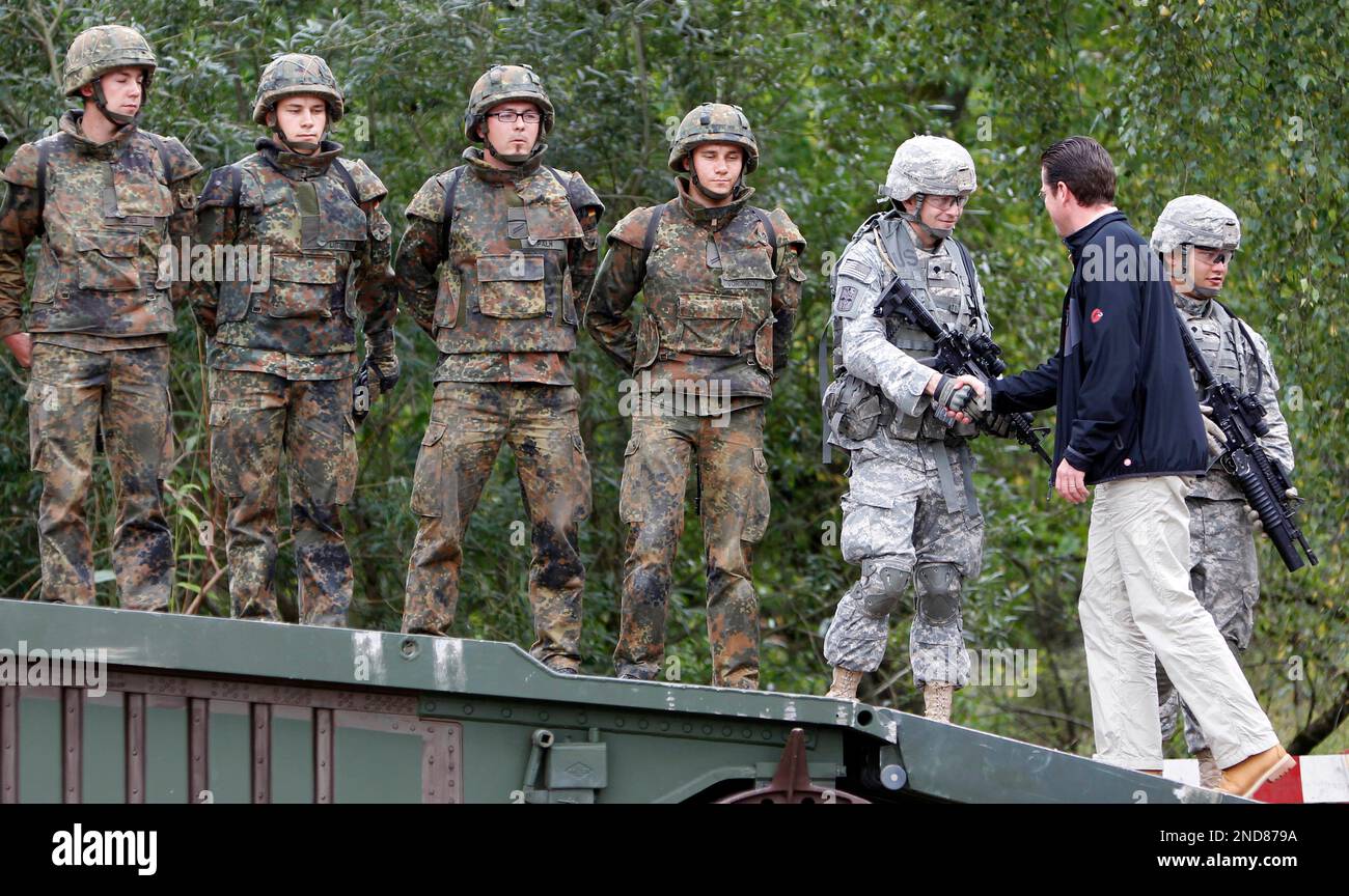 German Defence Minister Karl-Theodor zu Guttenberg, second right ...