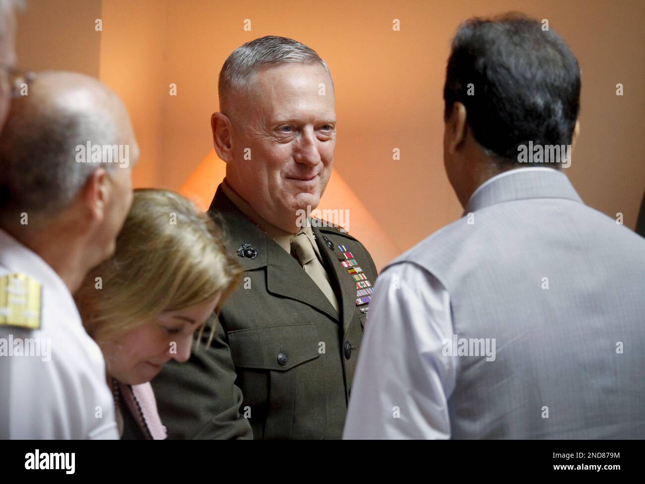 Commander of U.S. Central Command Gen. James Mattis, center, shakes ...