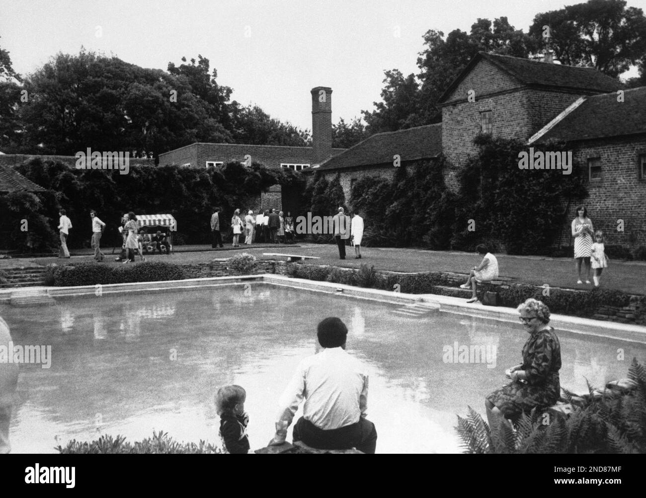 The swimming pool at Sutton Place Tudor Manor House in Surrey, England ...