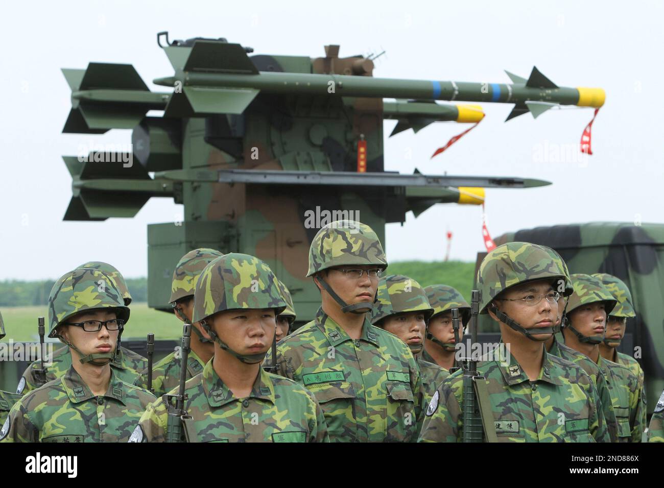 Taiwan air force stand in attention in front of a battery of the ...