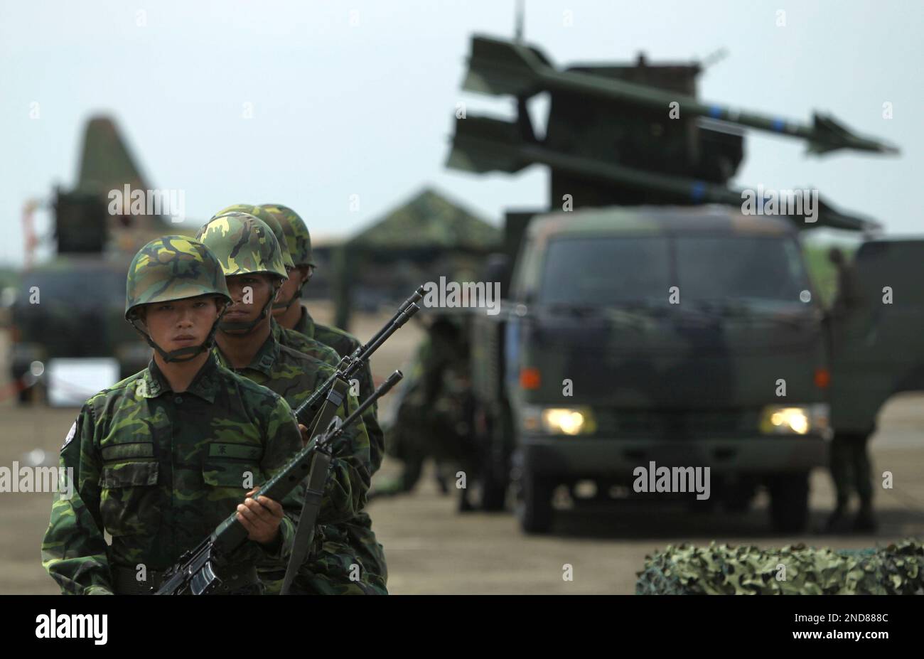 Taiwan air force stand in attention in front of a battery of the ...