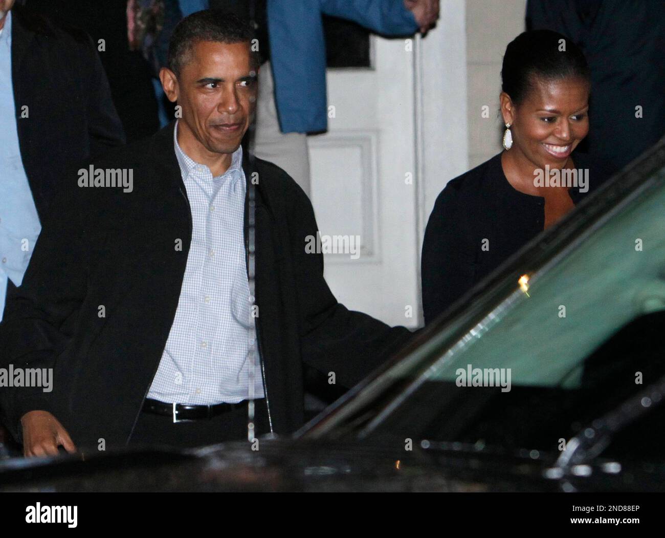President Barack Obama and first lady Michelle Obama leave The Sweet ...