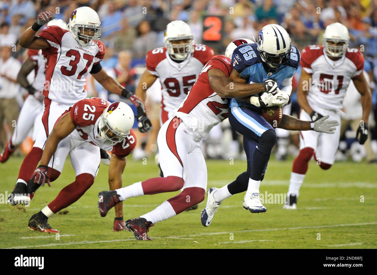 Tennessee Titans wide receiver Nate Washington (85) is brought down by ...