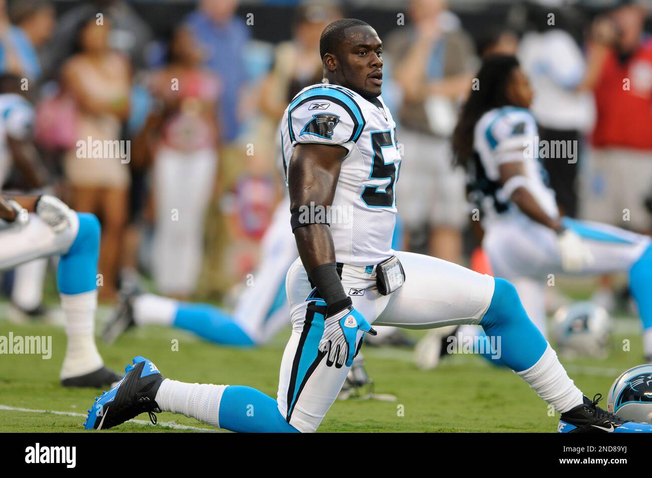 Carolina Panthers linebacker Jon Beason is shown warming up before an ...