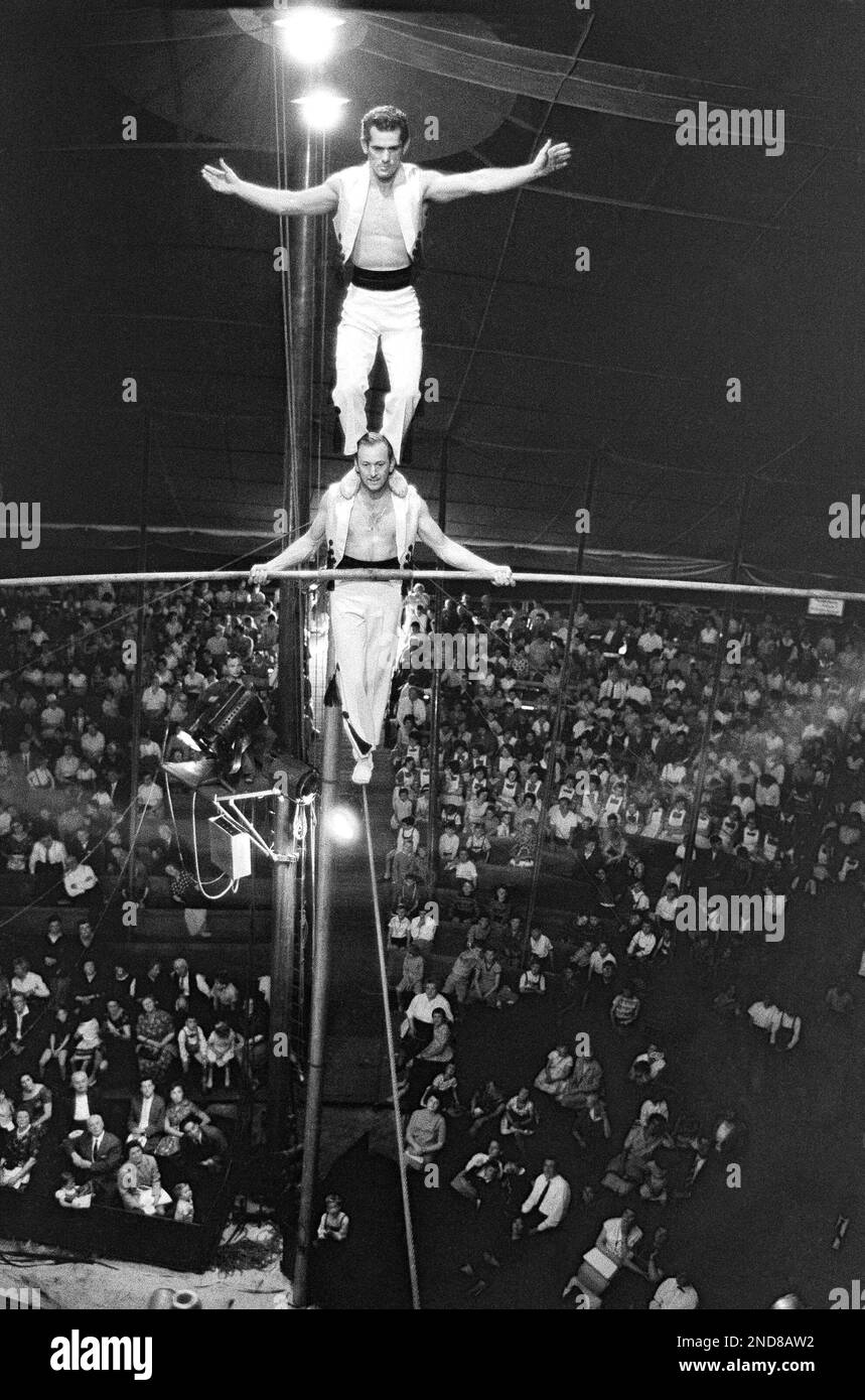 Gene Mendez on the shoulders of his partner, Joe Seitz, on July 18 ...