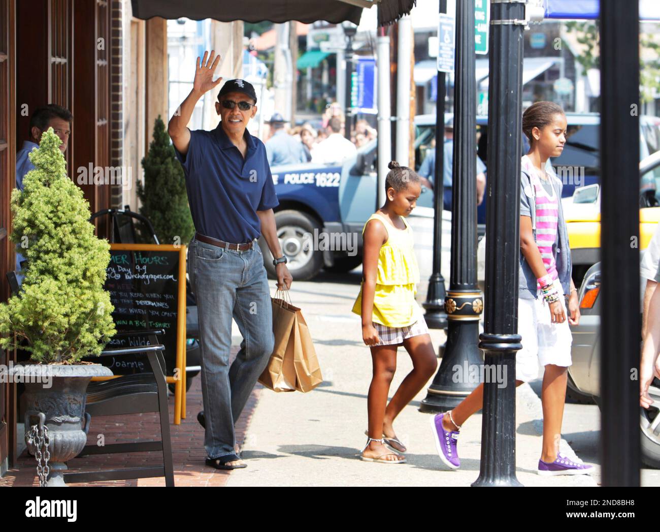 In this Aug. 20, 2010, photo President Barack Obama, with his daughters ...