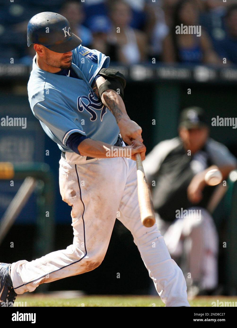 Kansas City Royals' Jason Kendall drives the ball into left for the ...