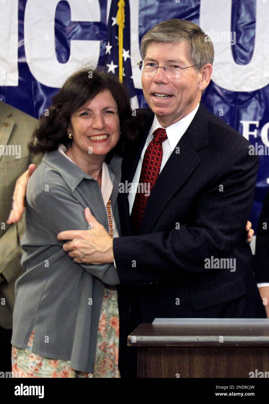 Bill McCollum, Republican candidate for Florida governor, gets a hug ...