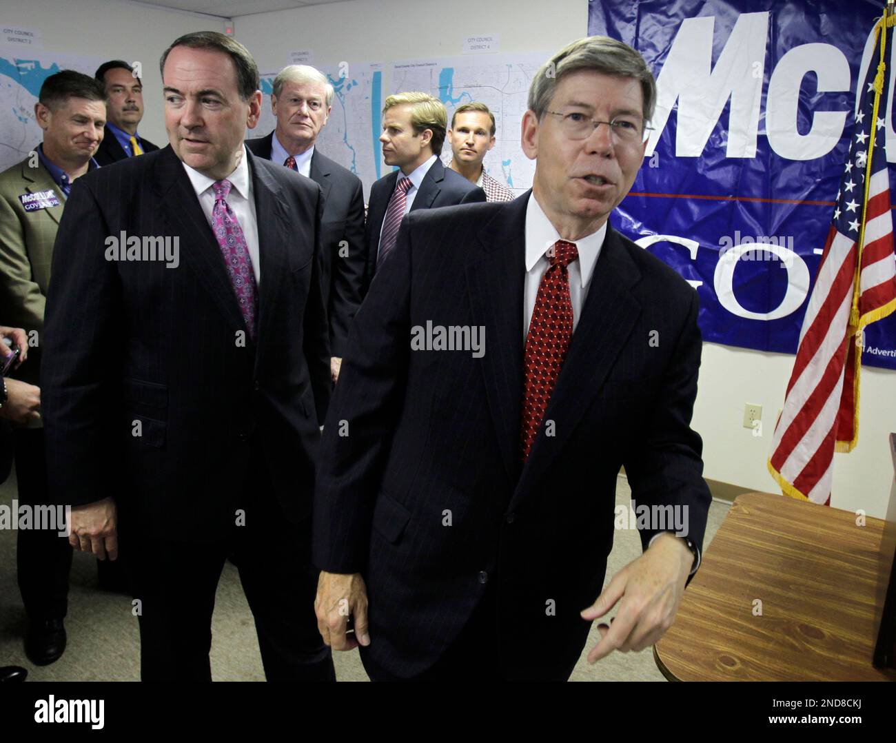 Bill McCollum, right, Republican candidate for Florida governor, talks ...