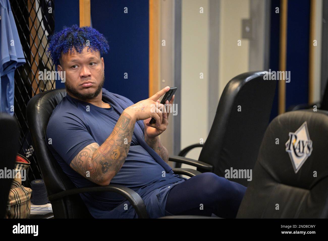 Tampa Bay Rays outfielder Harold Ramirez sits in the clubhouse before ...