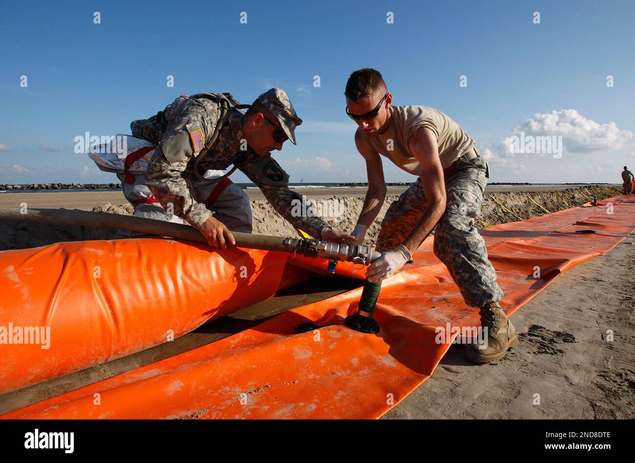 Louisiana National Guard Private First Class Donald Lambert, left ...