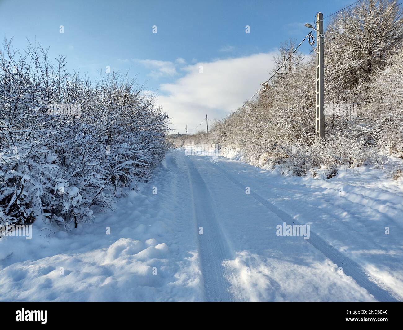 road with snow in the winter - Maramures, Romania Stock Photo - Alamy