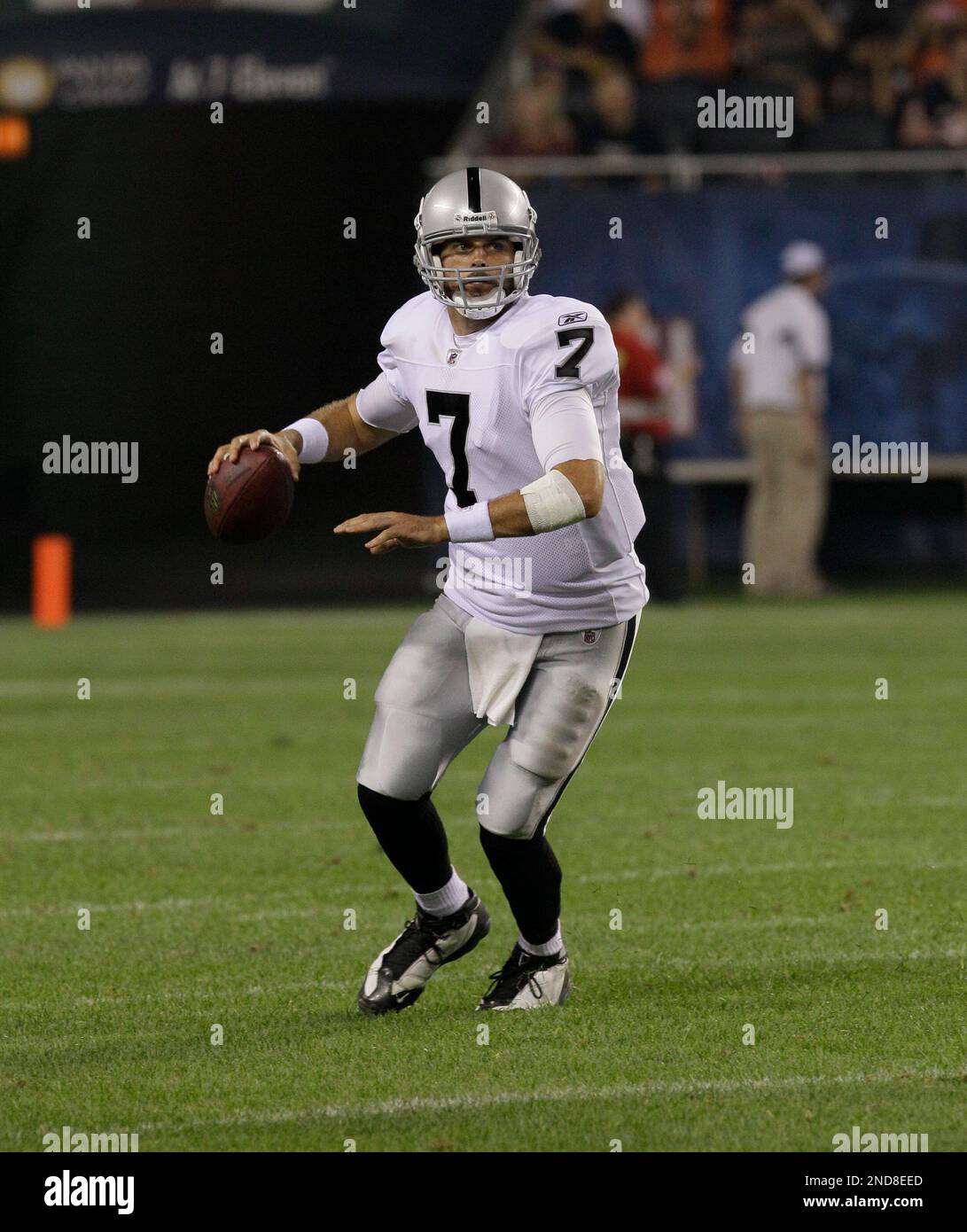 Oakland Raiders quarterback Kyle Boller rolls out to pass during a ...