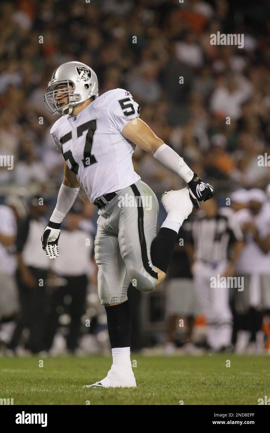 Oakland Raiders linebacker Ricky Brown (57) streches his keg during a ...