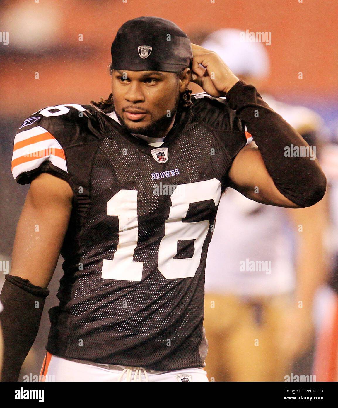 Cleveland Browns wide receiver Josh Cribbs walks off the field after an ...