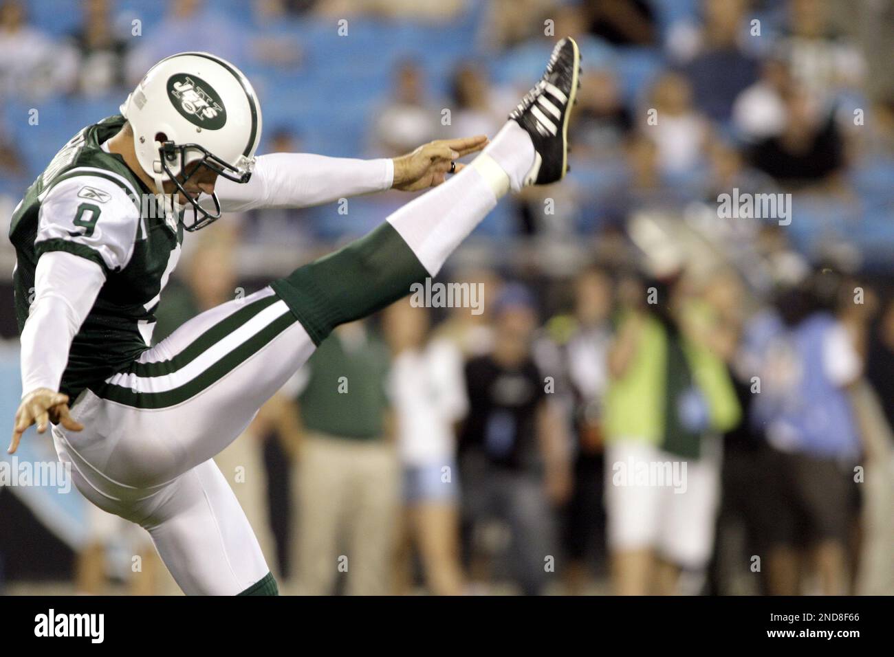 New York Jets punter Steve Weatherford punts against the Carolina ...