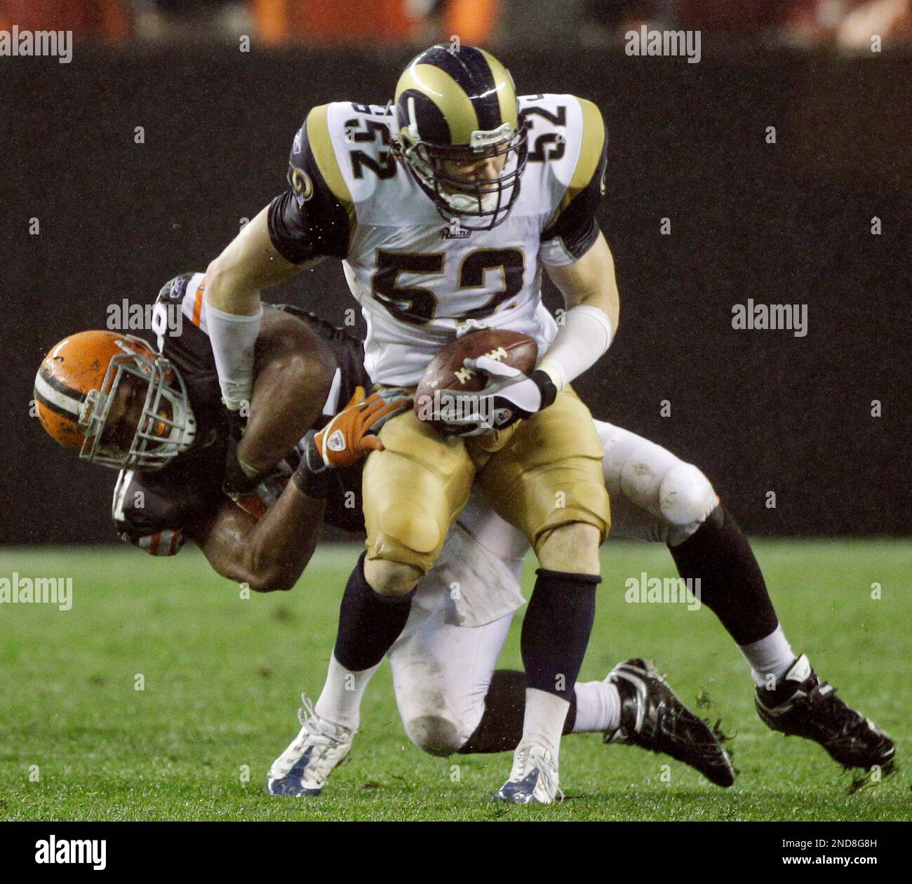 St. Louis Rams linebacker Bobby Carpenter (52) intercepts a ass ...