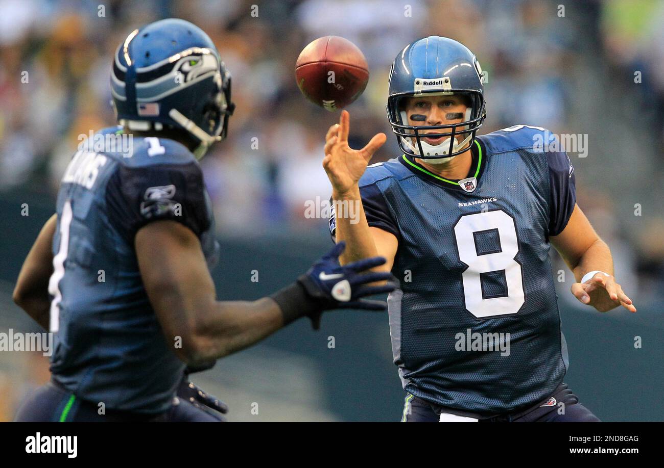 Seattle Seahawks quarterback Matt Hasselbeck makes a short pass to Mike ...