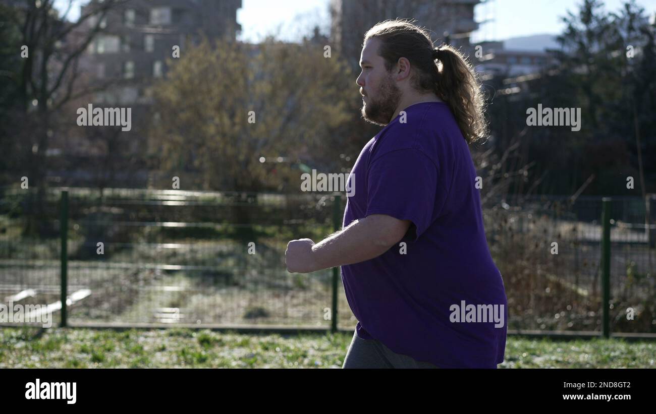 Tracking shot young man running hi-res stock photography and images - Alamy
