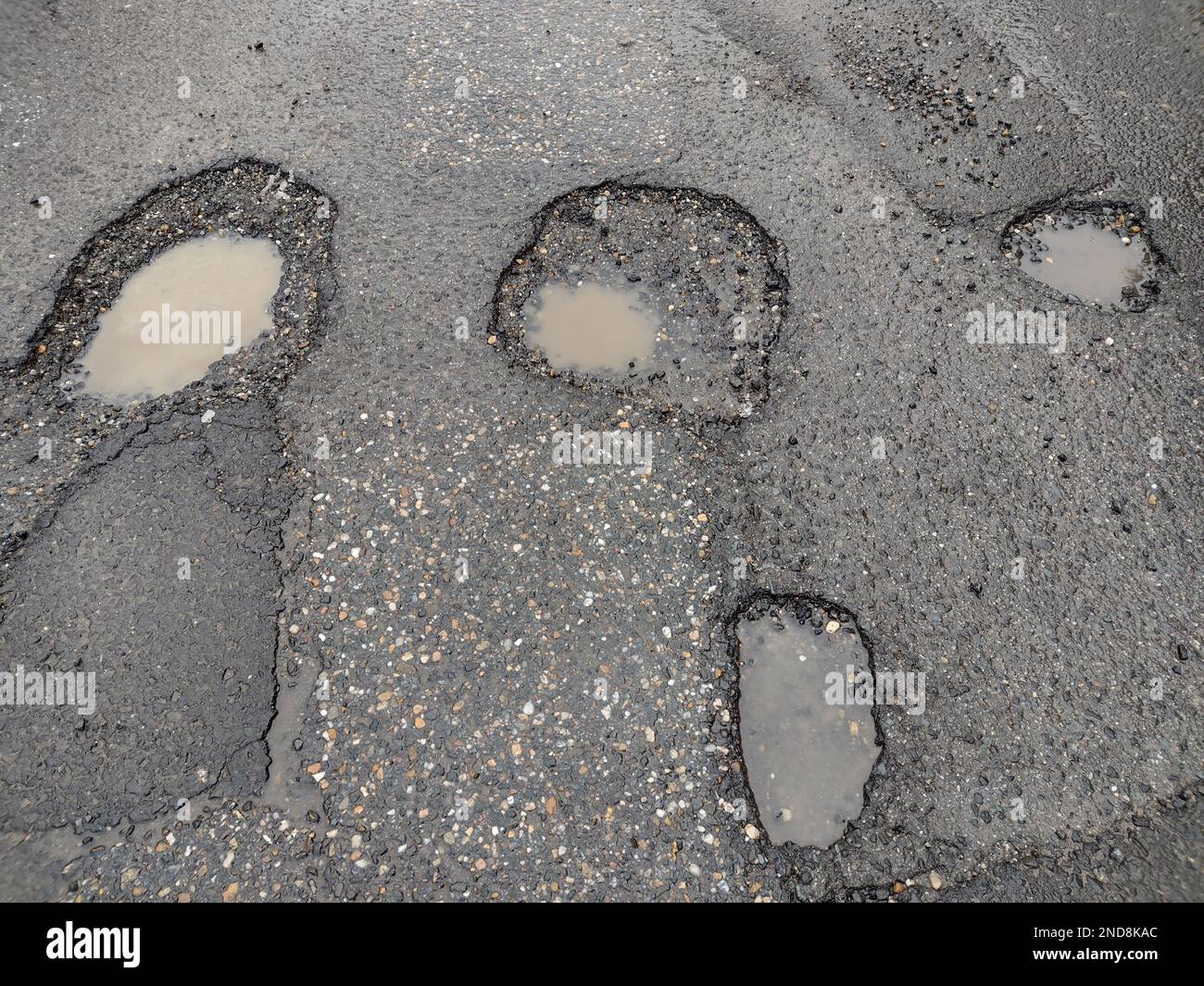 pits formed in asphalt - outdoor Stock Photo - Alamy