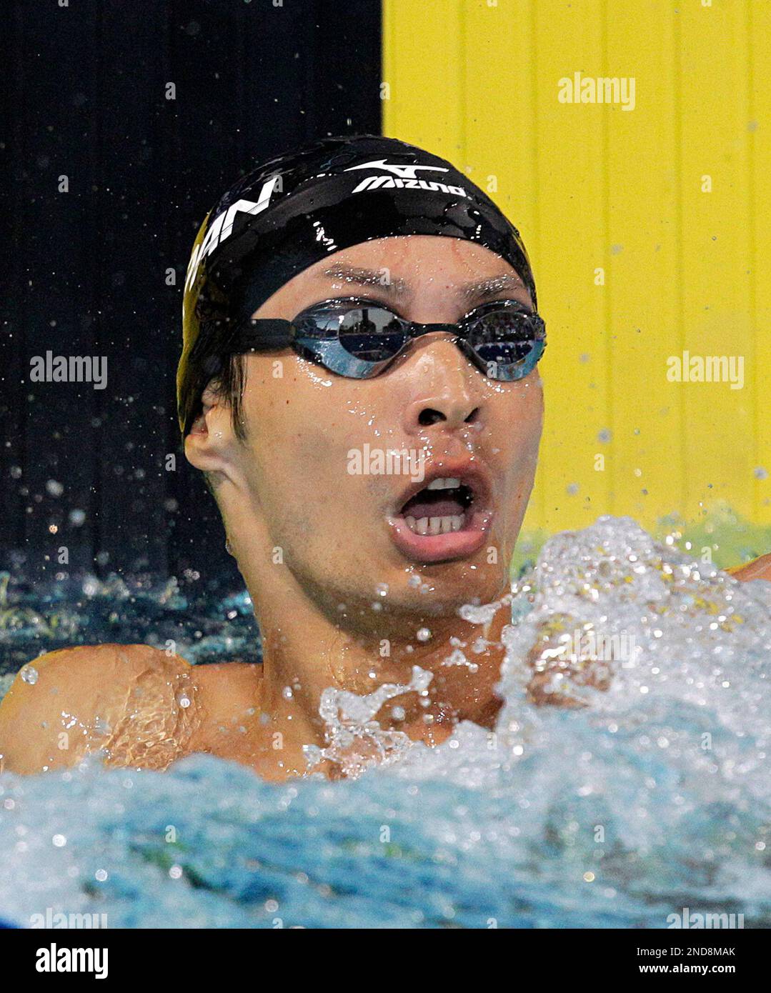 Ryosuke Irie, of Japan, looks at the results after competing in the men ...