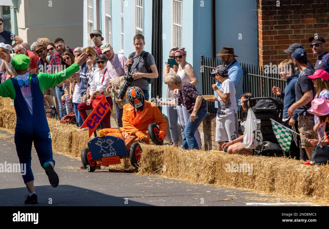 A soapbox driver has crashed into straw bails but is unhurt, meanwhile ...