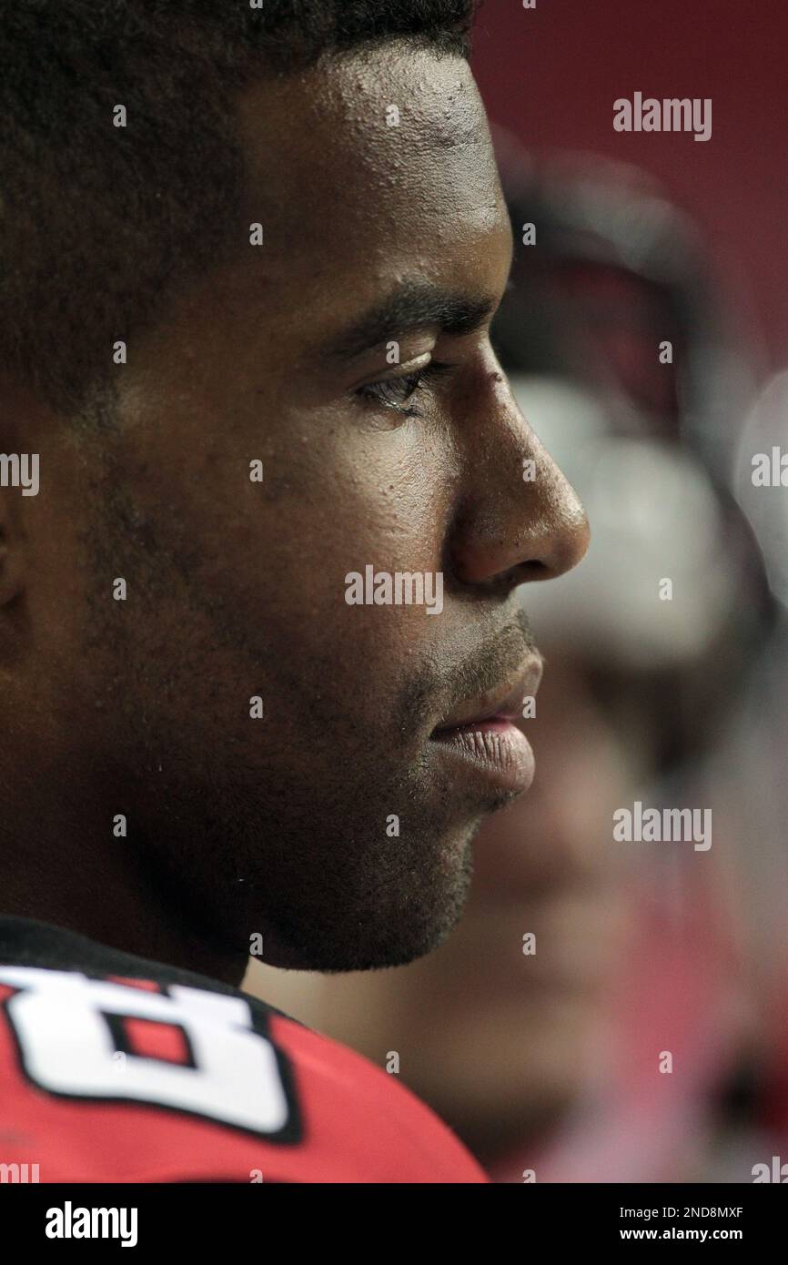 Atlanta Falcons safety Thomas DeCoud watches from the sidelines in the ...