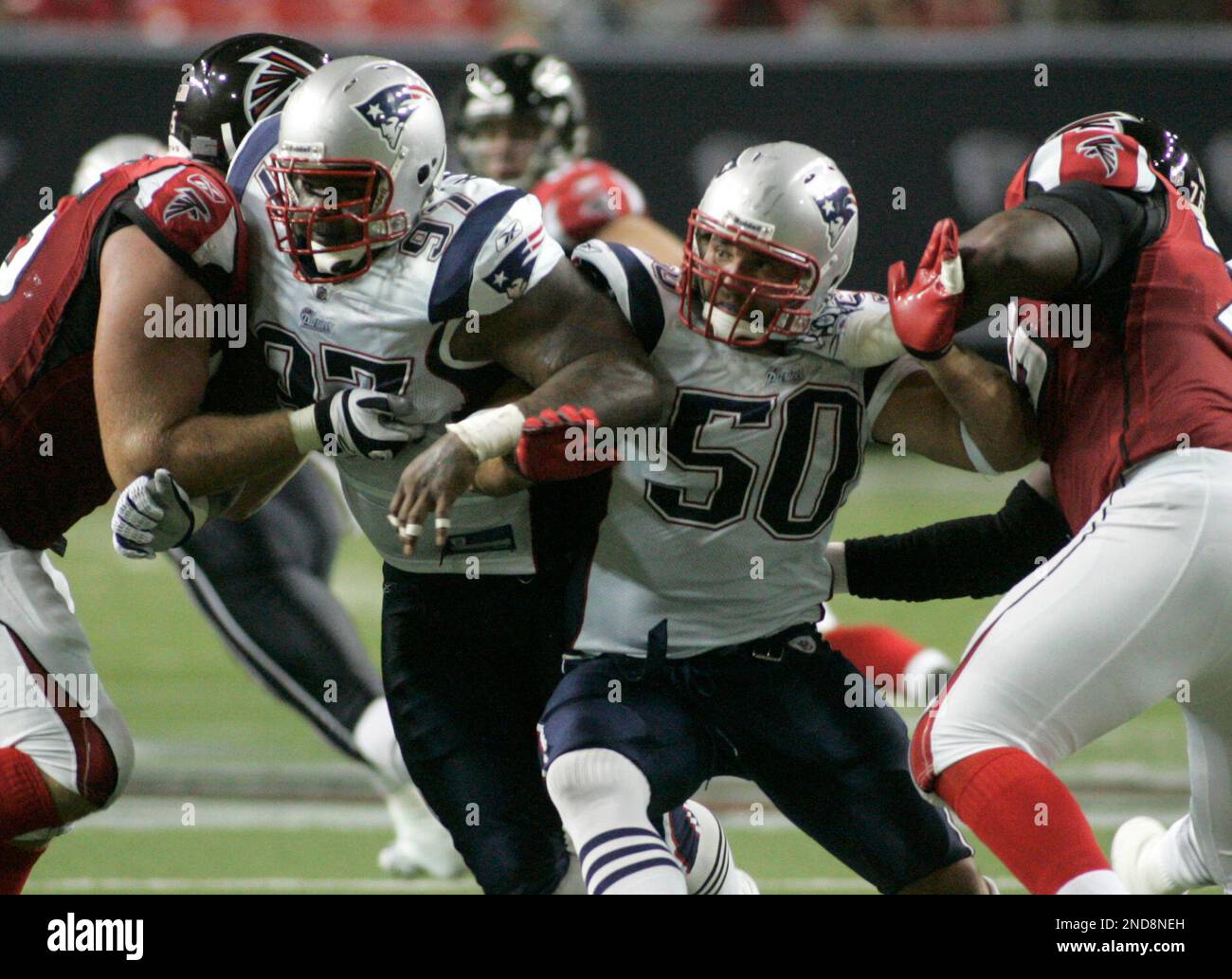 New England Patriots linebacker Rob Ninkovich (50) and defensive ...