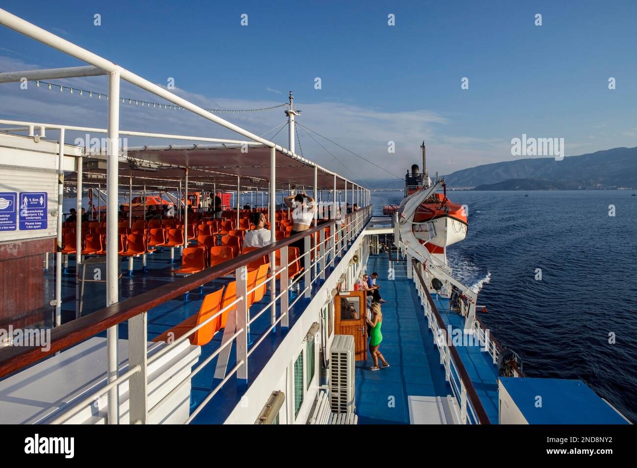 trip with ferry from Volos to Skiathos, tourists enjoying Stock Photo ...