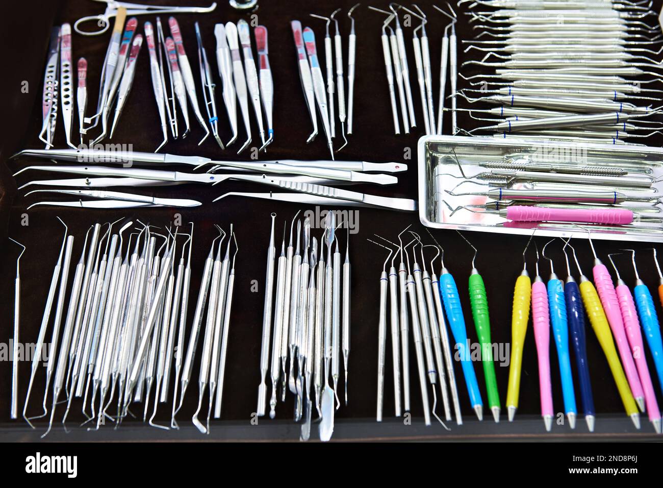 Dental instruments on black background Stock Photo - Alamy