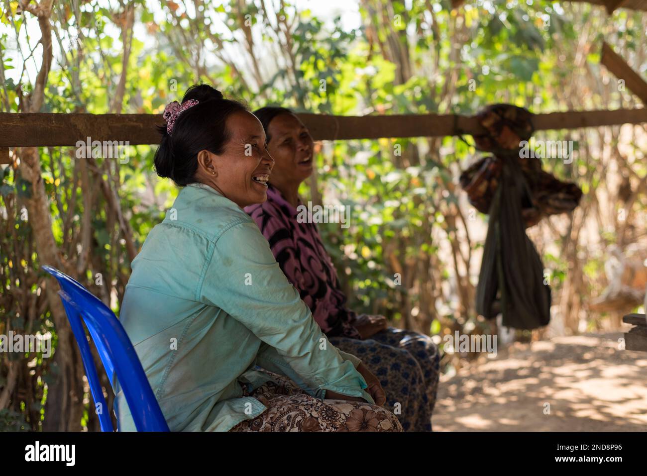 Community members laughing and sharing a joke during the CHAD ...