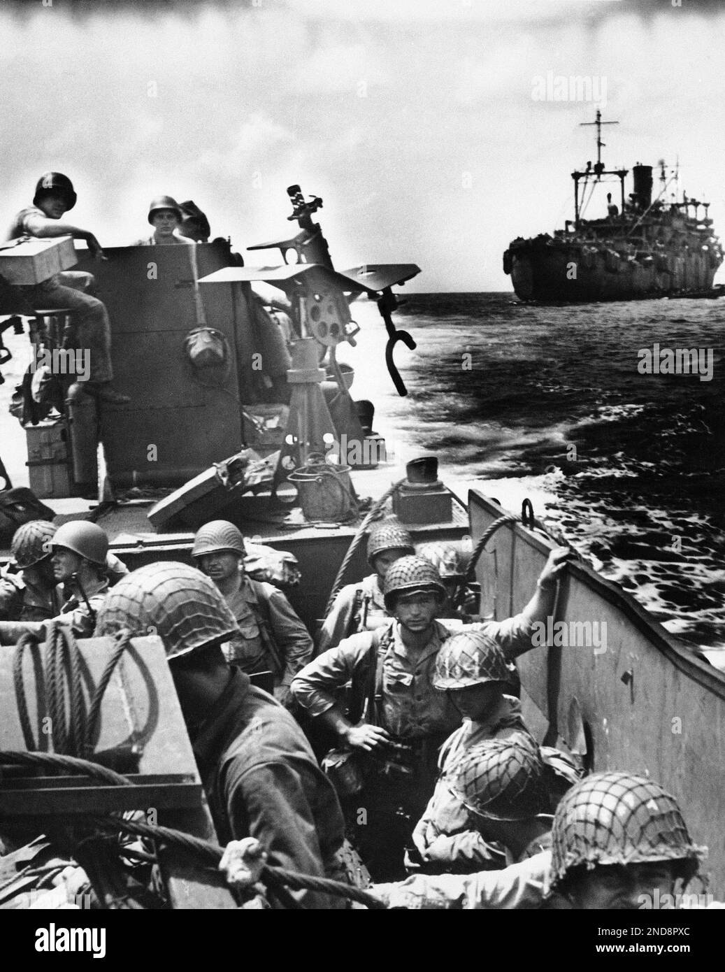 A U.S. Coast Guard manned tank lighter heads for the beach at Makin Jan ...