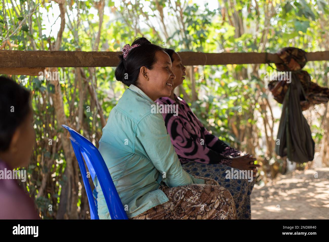 Community members laughing and sharing a joke during the CHAD ...