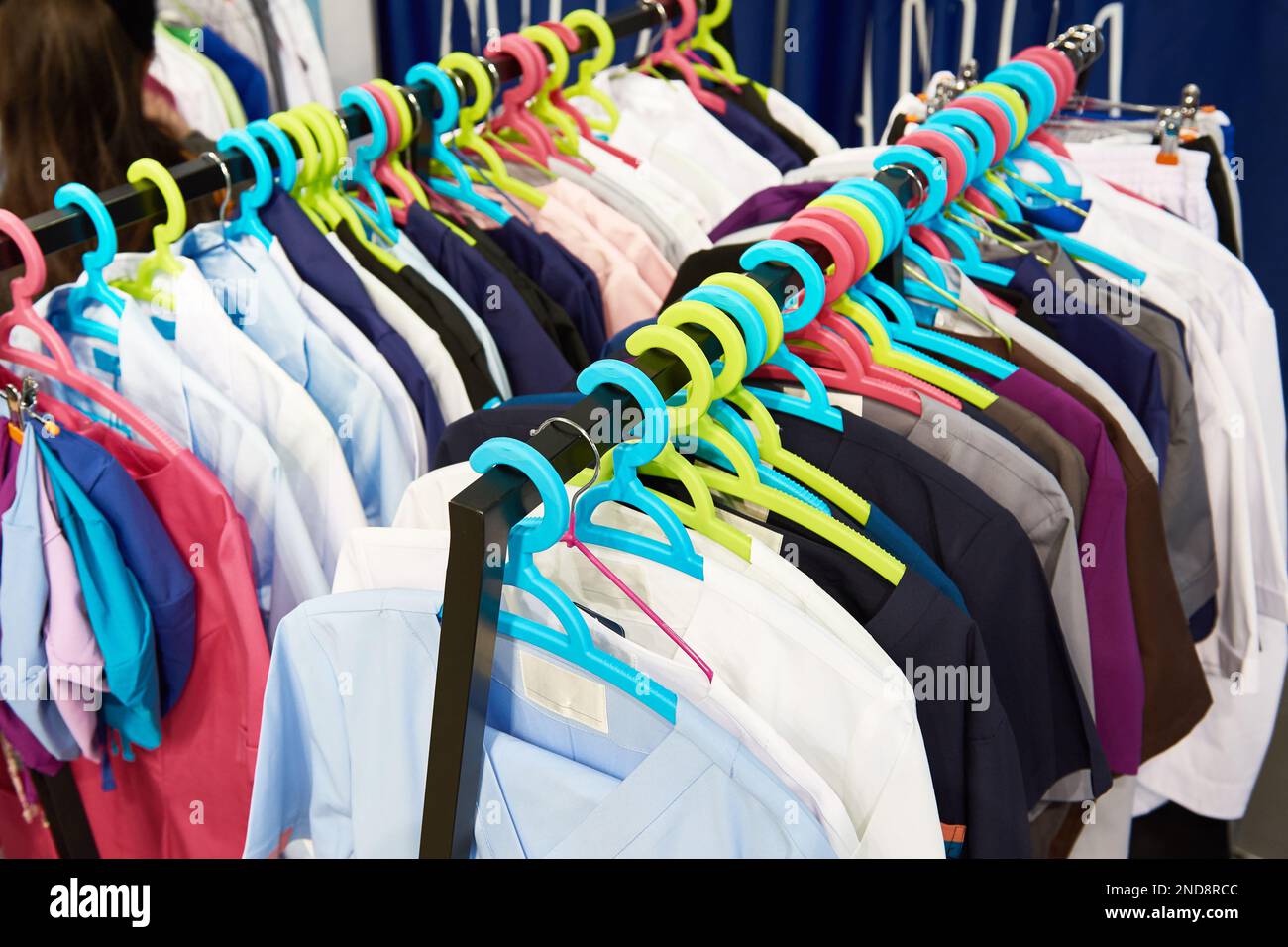 Medical clothes for doctors in the store Stock Photo - Alamy