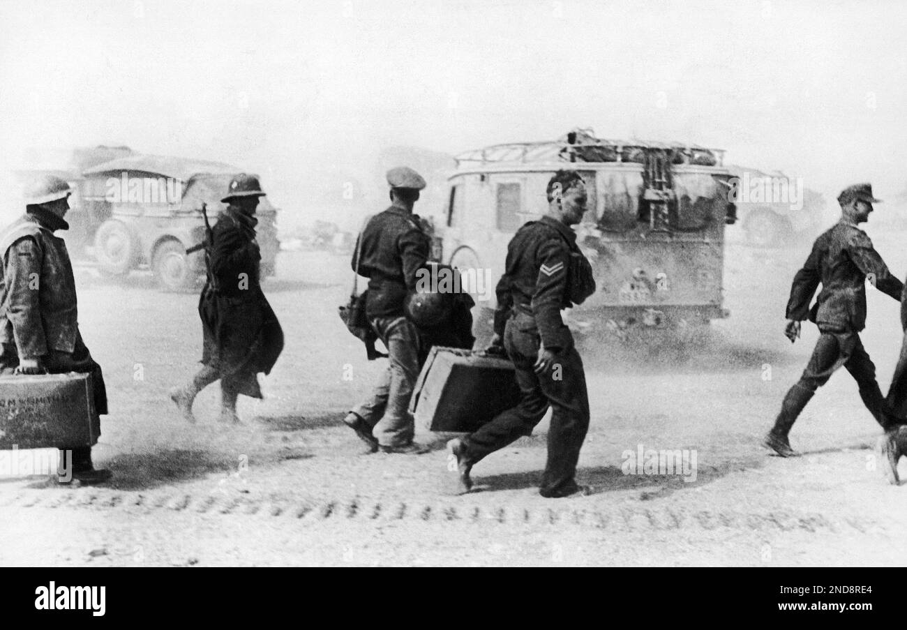 British soldiers, captured in North Africa by German forces, carry ...