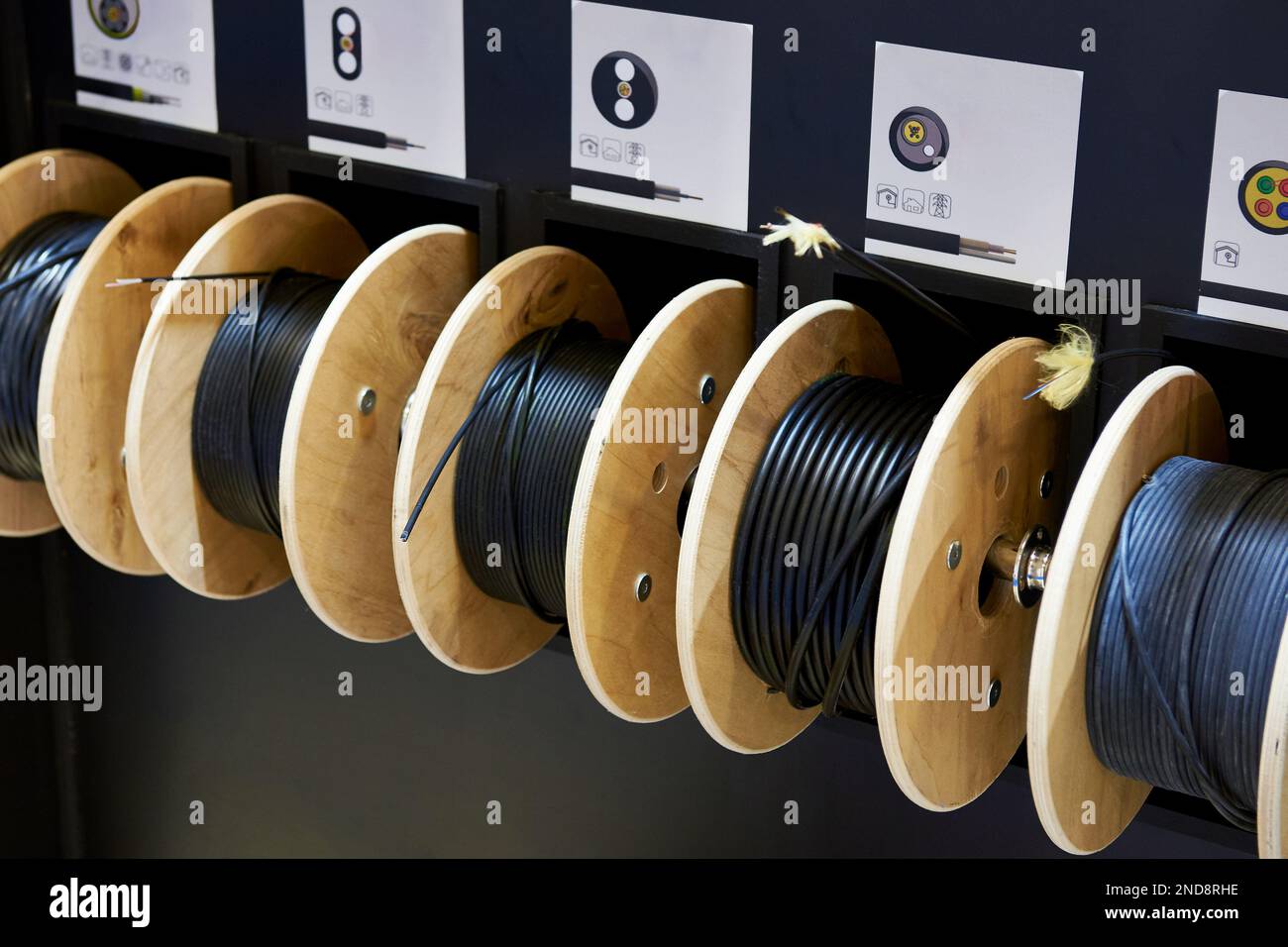 Dielectric cables in rolls on stand Stock Photo - Alamy