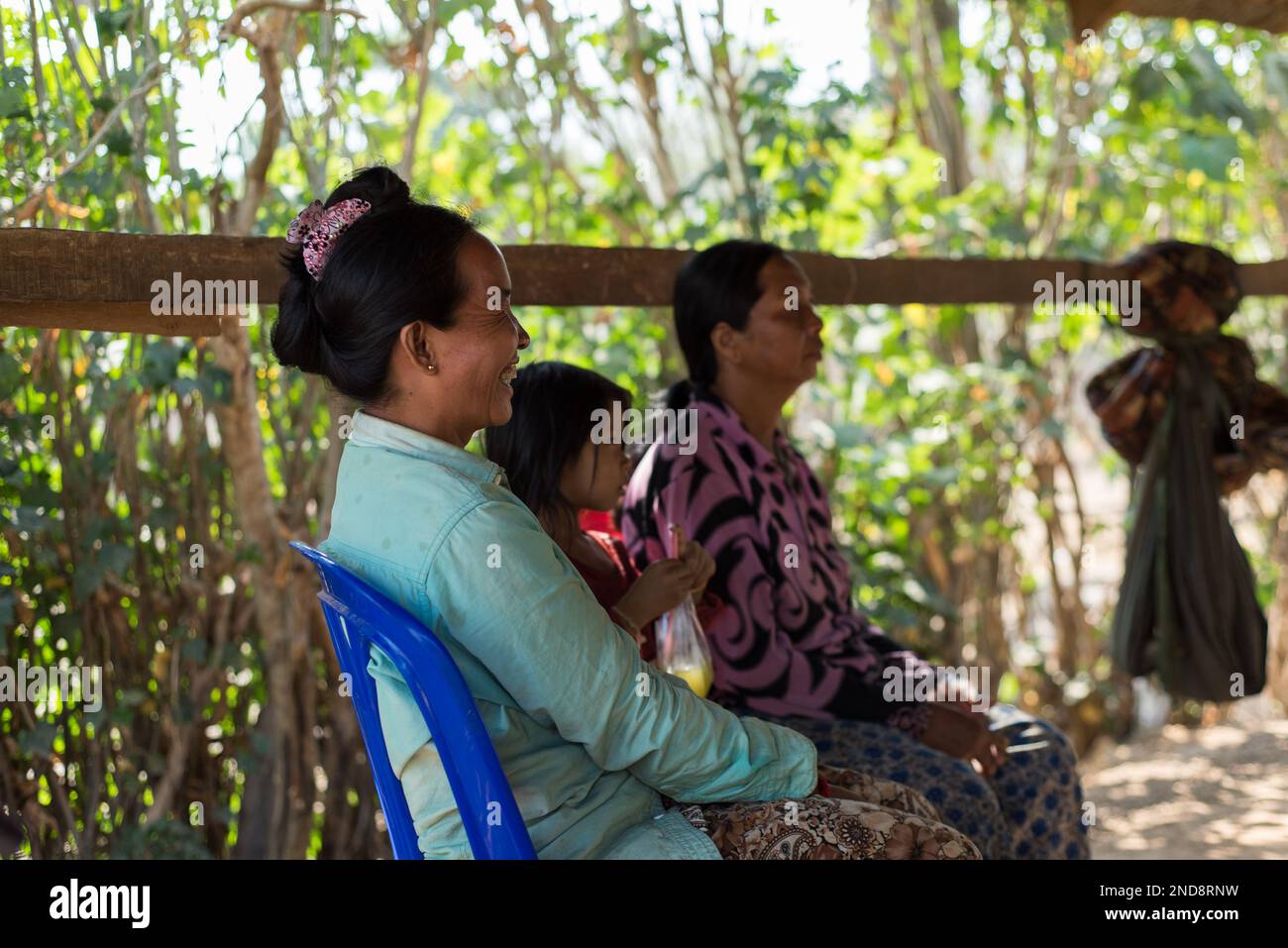 Community members laughing and sharing a joke during the CHAD ...